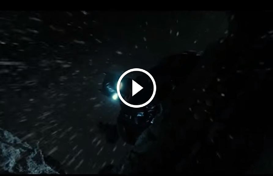 Batman uses lead-filled grenade against Superman in the new TV spot