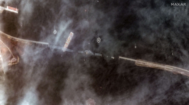 Baltimore bridge collapse aftermath photographed from space